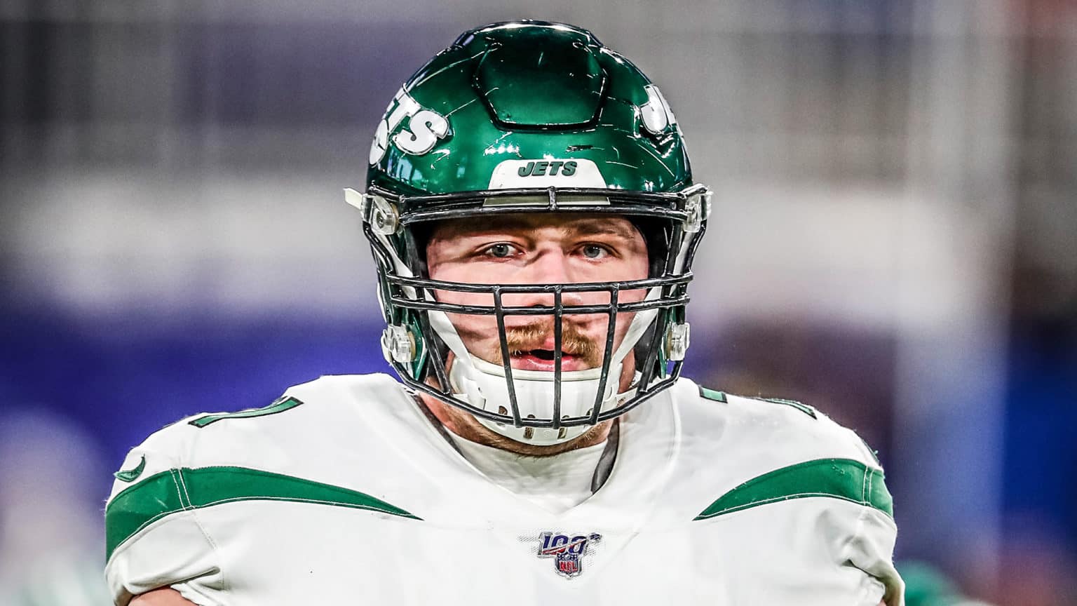 New York Jets re-sign guard Alex Lewis